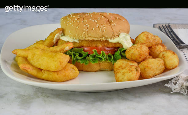 fish sandwich with beer battered shrimp and tater tots 이미지 (2155179603 ...
