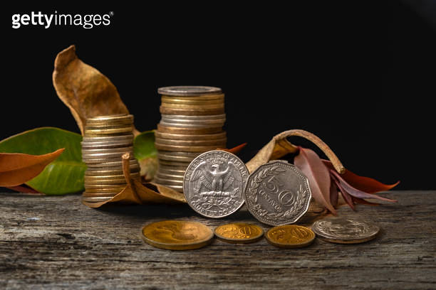 Money amount concept: shiny gold coins, symbolic representation of ...