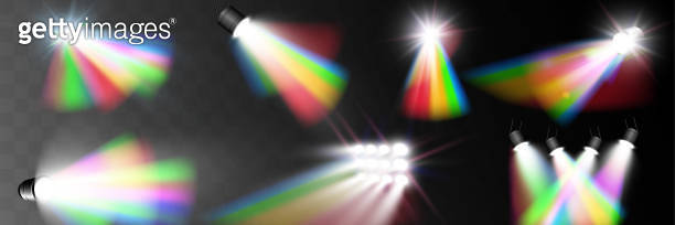Rainbow spotlight. Light beams spectrum,vector lens flare effect. Magic ...