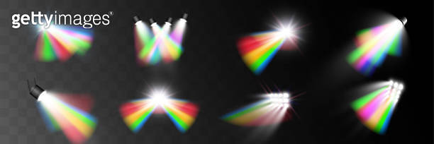 Rainbow spotlight. Light beams spectrum,vector lens flare effect. Magic ...