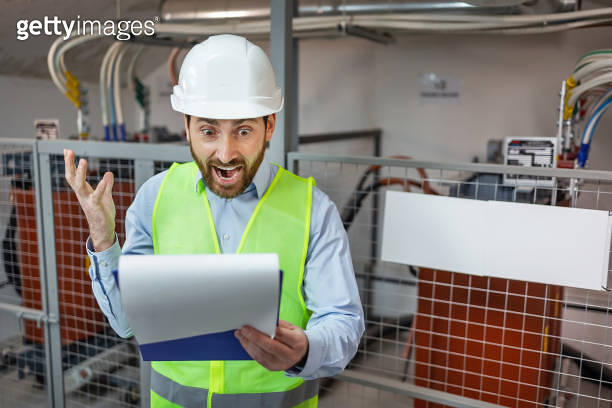 architect inspector man wearing builder safety helmet and using ...