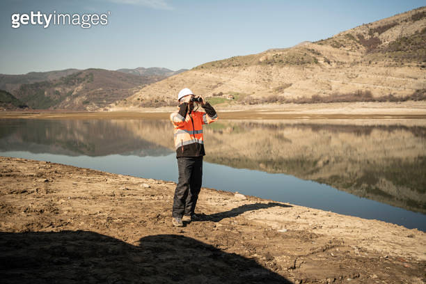 Improving Biodiversity Protection. Field Biologist doing nature ...
