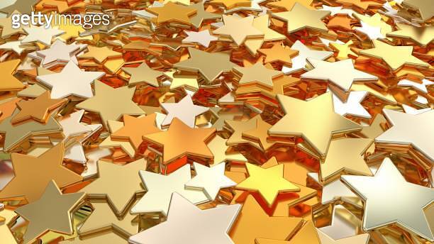 Rotating Pile Of Gold Shiny Star Shaped Metal Tokens Reflecting Light ...