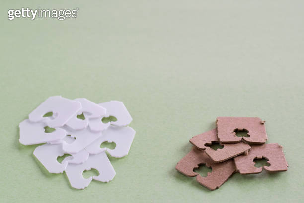 Plastic and carboard paper bread clip tags, concept of sustainable eco ...
