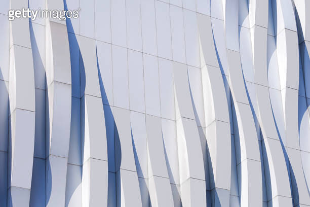 Dimension curve lines of white and gray aluminum composite tile wall ...