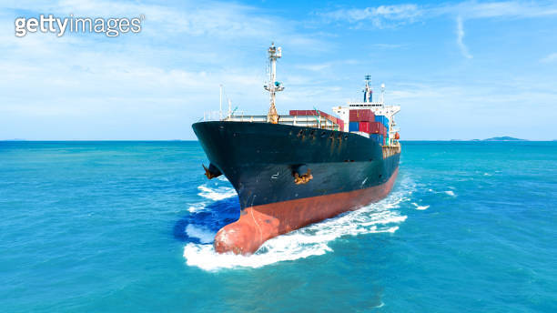 Nose of Container Vessel Ship running in the ocean. Nose cargo ship ...