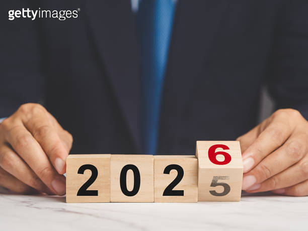 Flipping of 2025 to 2026 on wooden cubes for preparation of new year ...