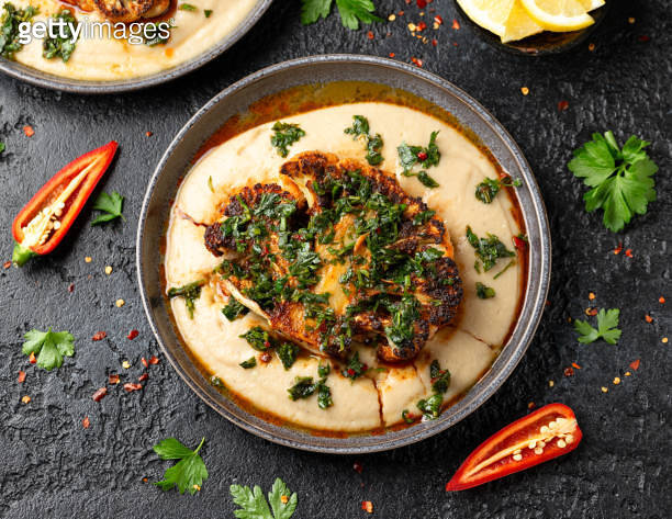 Cauliflower steaks with chimichurri sauce and butter bean puree ...
