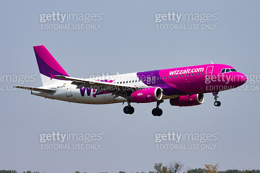 Wizz Air passenger plane at airport. Schedule flight travel. Aviation ...