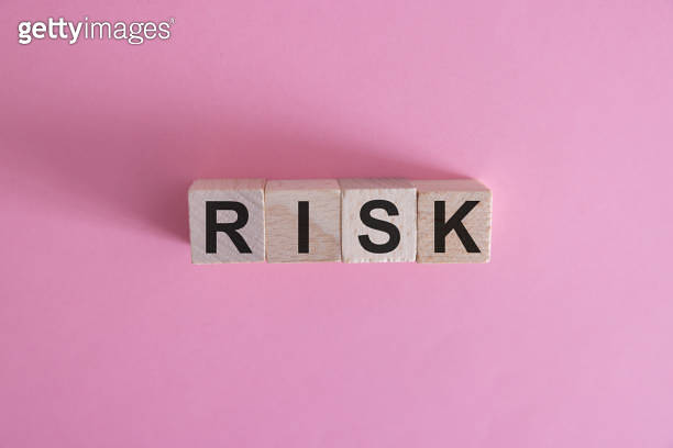 Wooden cubes with the word risk. Risk taking, risk management or ...
