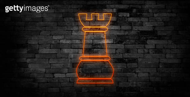 Rook, castle, tower icon. Yellow, orange, red neon icon at dark reddish ...