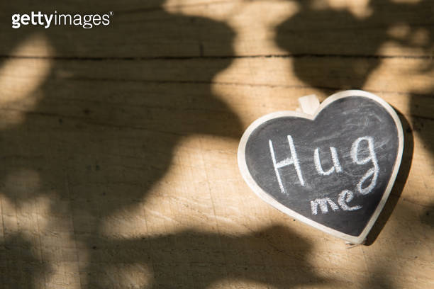 Hug me hand drawing phrase on a heart, Sharing a Hug concept 이미지 ...