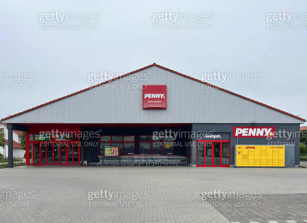 Penny store facade in Germany with cart parking and DHL machine 이미지 ...