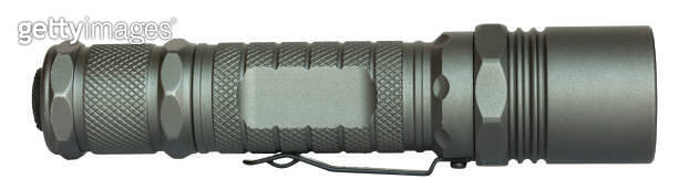 Broadside view of an all metal flashlight 이미지 (2136095767) - 게티이미지뱅크