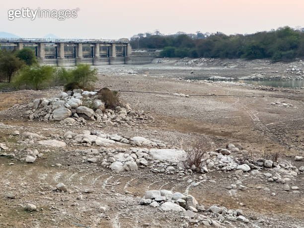 Dry river bed with sluice gates of Sathanur Dam which forms the ...