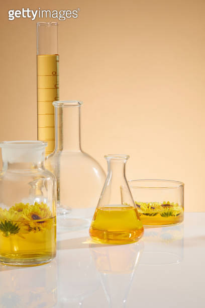 Several lab instrument including glass bottle, boiling flask ...