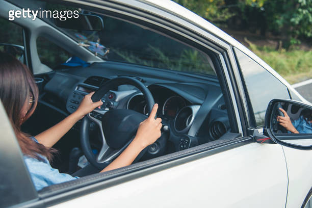 Happy asian women drive new car. Women Hand give remote control car key ...