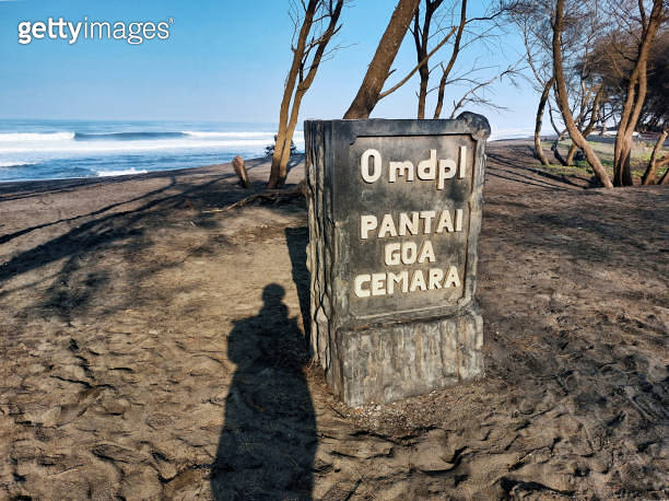 The 0 meters above sea level marker stone on Goa Cemara beach, Bantul ...