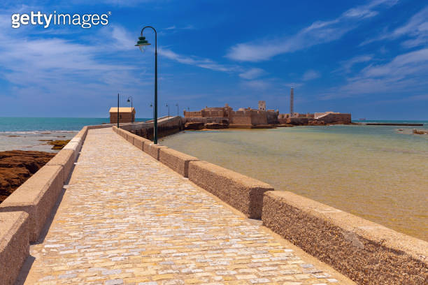 Fort San Sebastian and the stone breakwater bridge leading to it on a ...