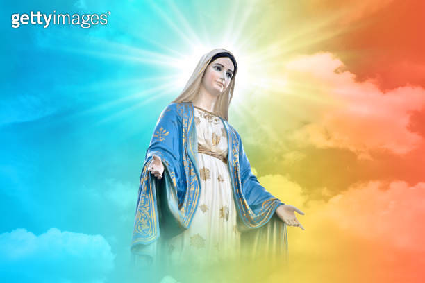 Statue of Our lady of grace virgin Mary with Fantasy magical landscape ...