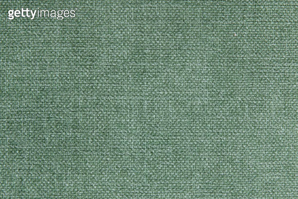 Green textile with tightly woven texture, robust and durable material ...
