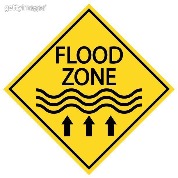 Flood zone. Warning sign with symbol of water level rising and text ...