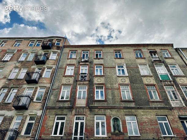 European disadvantaged area of the city with old, unkempt buildings ...