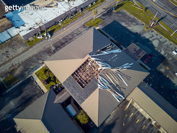 Hurricane hit public buildings in Perry, FL: public building roof ...