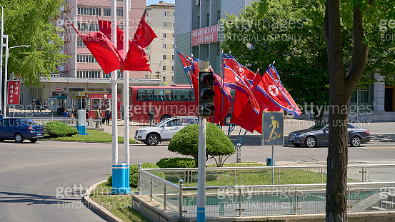 The central streets of Pyongyang are decorated with national flags of ...