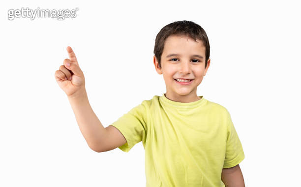 excited child pointing to the side 이미지 (2158978540) - 게티이미지뱅크