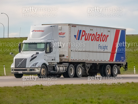A Purolator shipping delivery cargo truck on the road. 이미지 (2152543599 ...