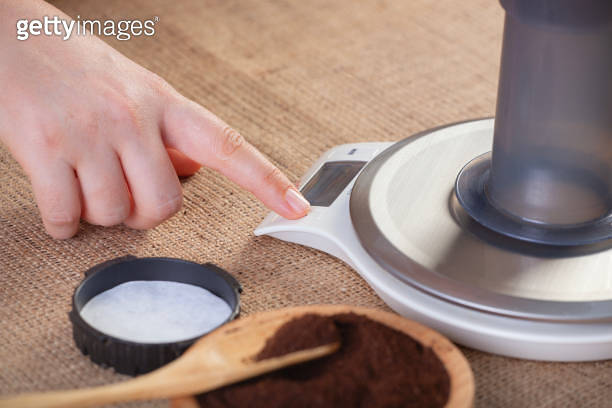 Ground coffee and adjusting the amount of coffee, weighing the coffee ... Ground coffee and adjusting the amount of coffee, weighing the coffee ...
