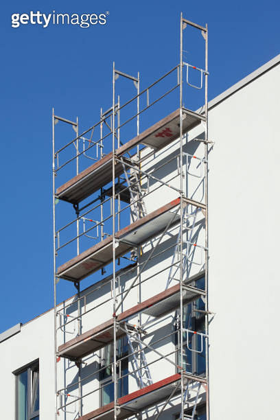 Scaffolding, Construction site, Modern white residential building ...