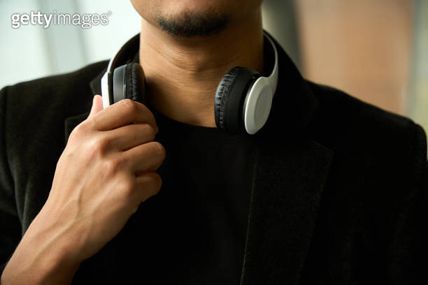 Close up photo of man with headphones around neck 이미지 (2159961665) - 게티 ...