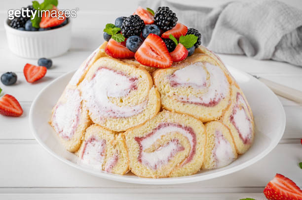 Charlotte Royale Cake with strawberry cream inside and decorated fresh ...