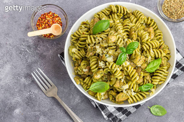 Basil Pesto Chicken Pasta Made with Fusilli, Served with Herbs, Chilli ...