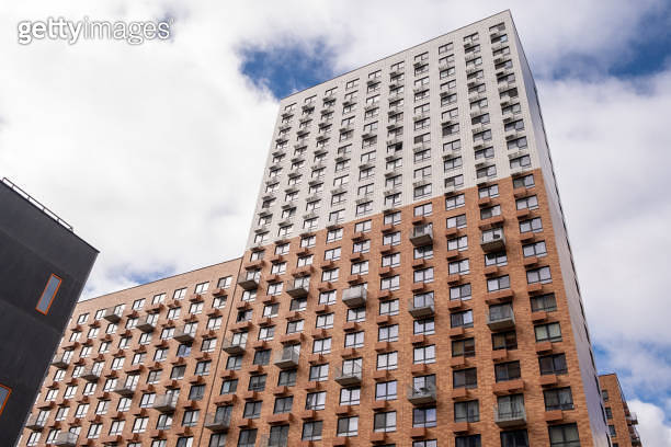 New buildings in Moscow, high-rise bright creative house and against ...