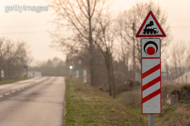 Level crossing without barrier ahead sign in Hungary (2063418576) - 게티이미지뱅크