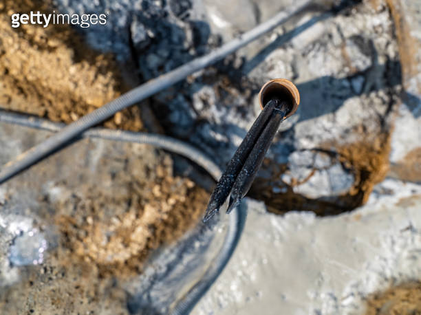 Casing pipe with polyethylene ground loop pipes in the process of being ...