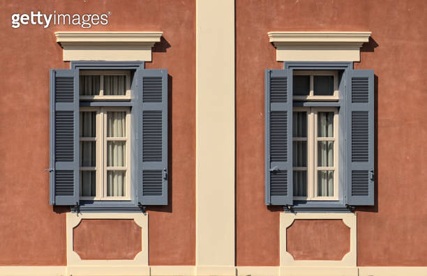 colorful windows on historic building in nafplio, greece (ornate ...