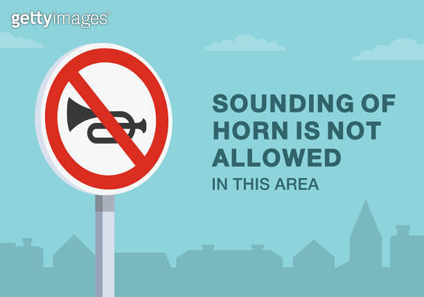 Safe driving tips and traffic regulation rules. Close-up of european "no horn or no honking ...
