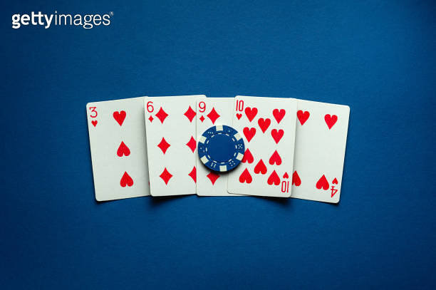 Playing cards and chips on a blue table in a poker club. Concept of a ...