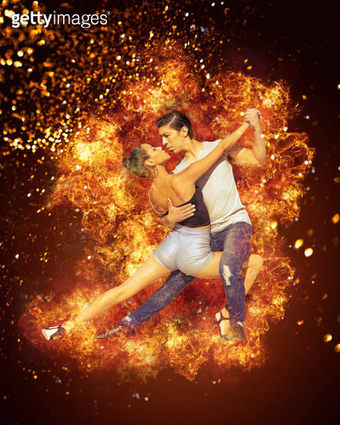 Argentine couple dancing tango between fire and flames 이미지 (2052874340 ...