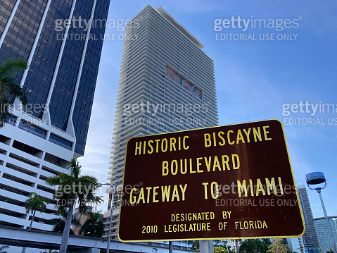 Historic Biscayne Boulevard sign against a backdrop of high-rise ...