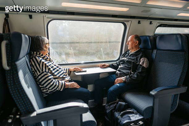 Senior Couple Riding In A Train In Switzerland 이미지 (1994623222) - 게티이미지뱅크