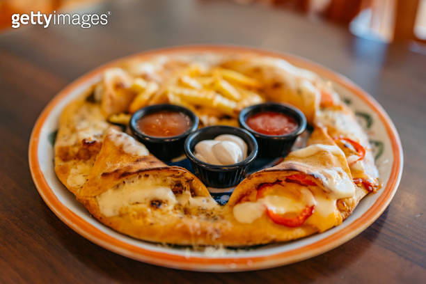 Ring Shaped Stuffed Pastry (Italian Crescent Ring) Served With Dipping ...