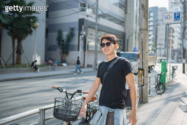 GenZ tourist thai men traveling kyoto walking along street look at ...