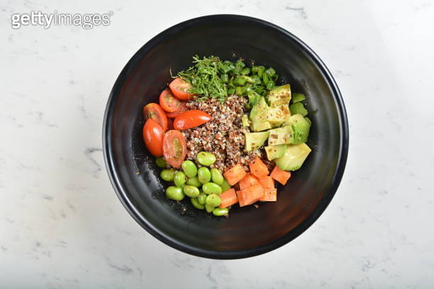 western trio quinoa grain salad bowl with avocado, tomato, pea bean ...