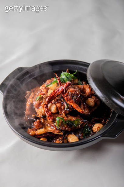 local cook live fresh catfish meat with spicy red dry chili asam sauce ...