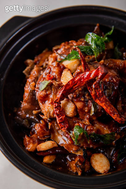 local cook live fresh catfish meat with spicy red dry chili asam sauce ...